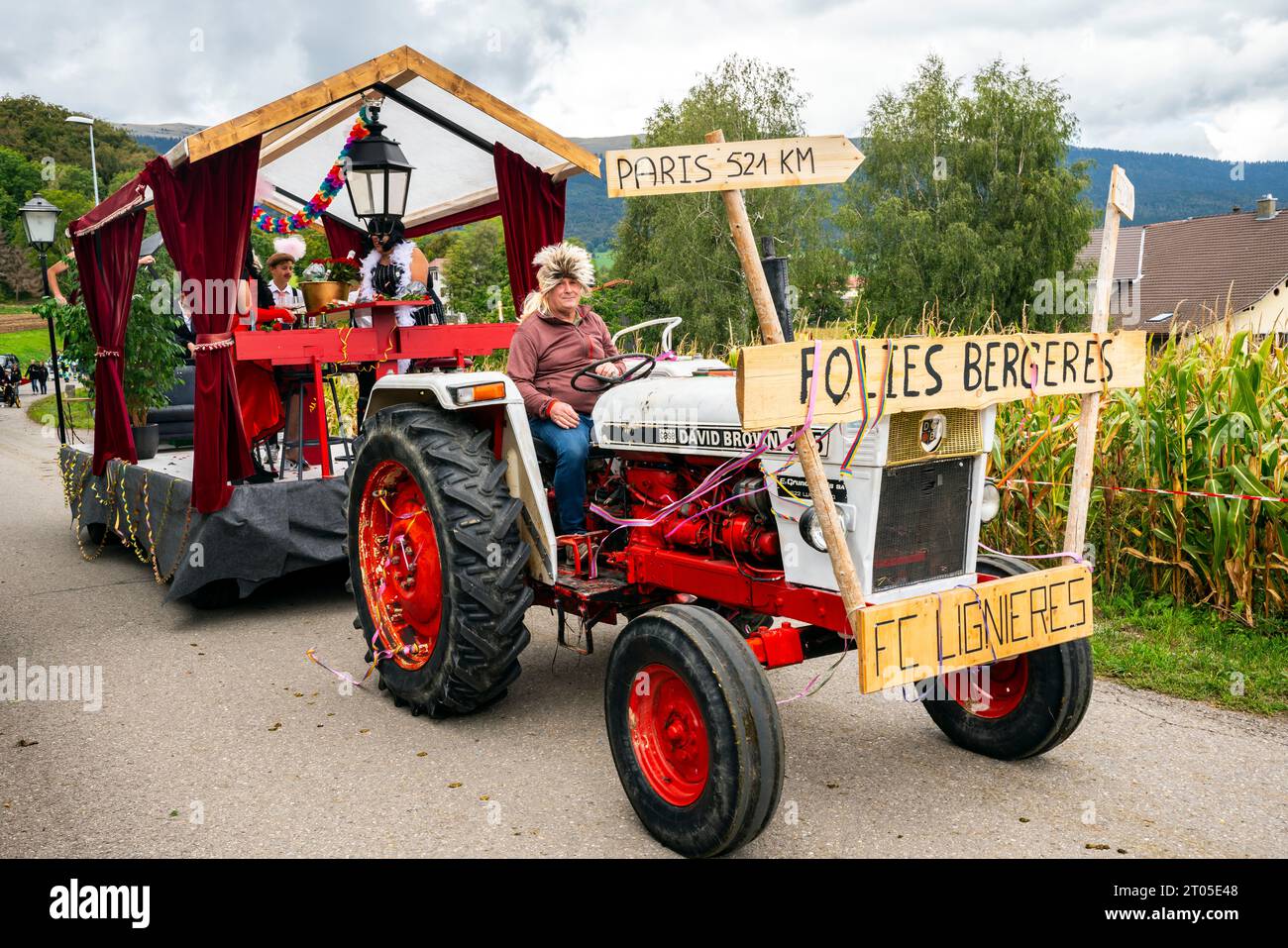 Villagers dressed in traditional costumes proudly take part in the ...
