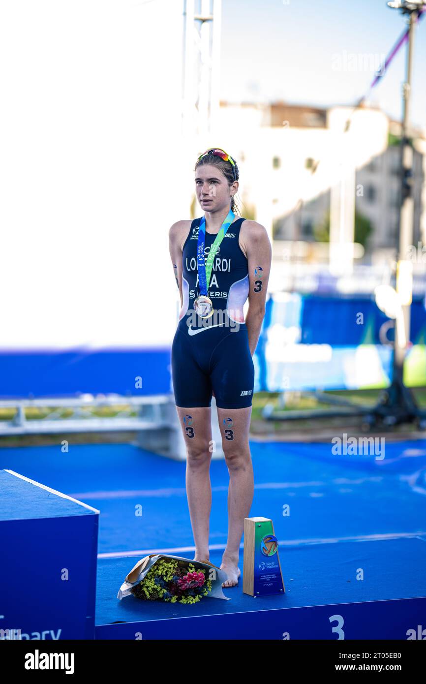 Emma Lombardi on the podium with the awards ceremony in the 2023 World ...