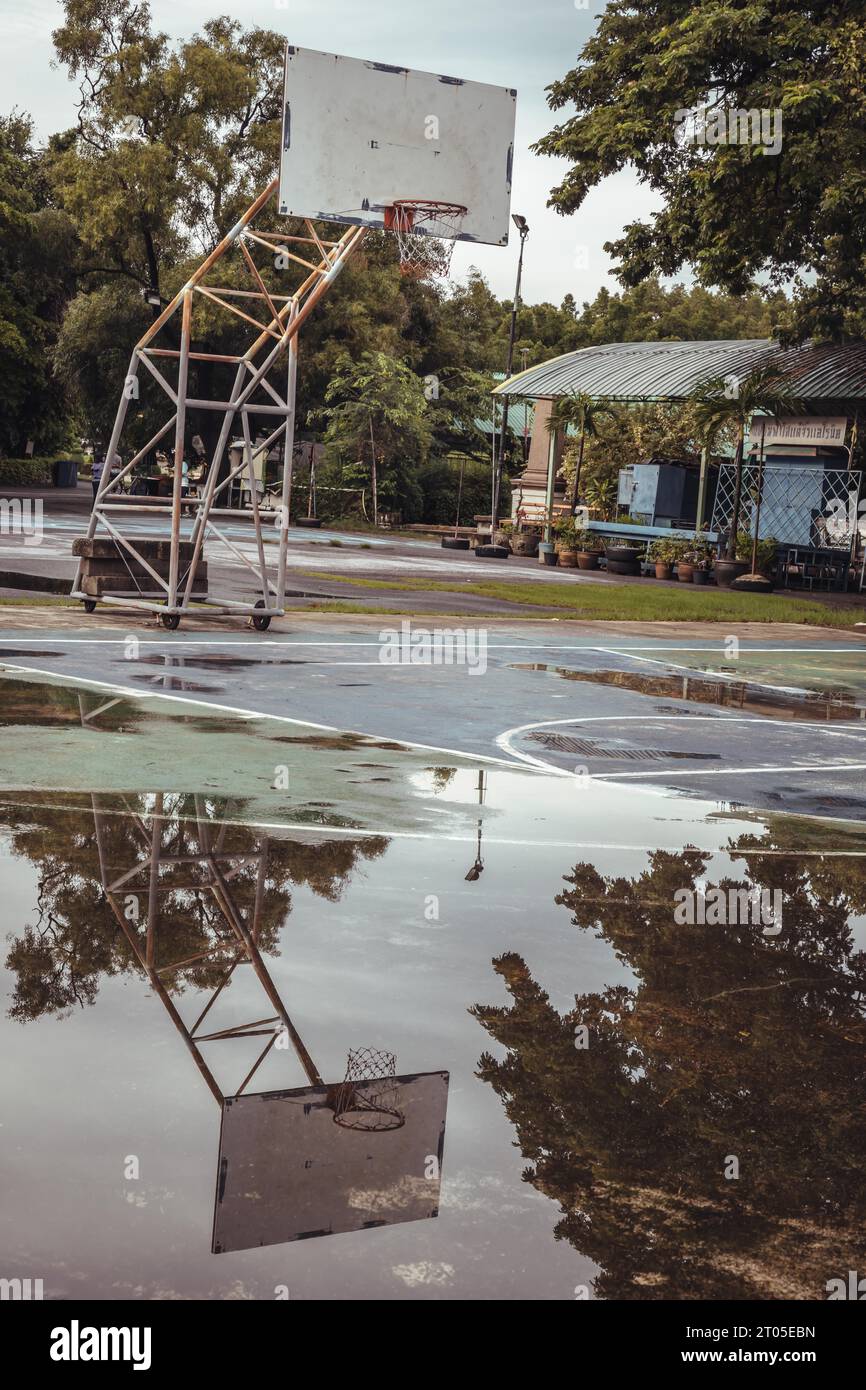 Basketball wooden backboard with the hoop metal ring and the white net ...