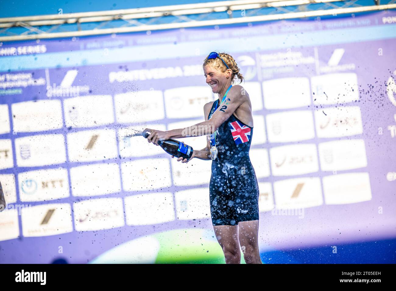 Beth Potter on the podium with the awards ceremony in the 2023 World ...