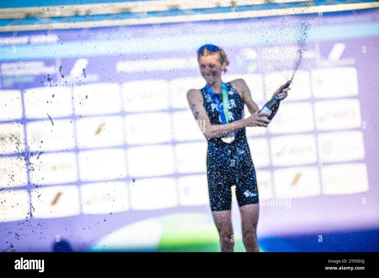 Beth Potter on the podium with the awards ceremony in the 2023 World ...