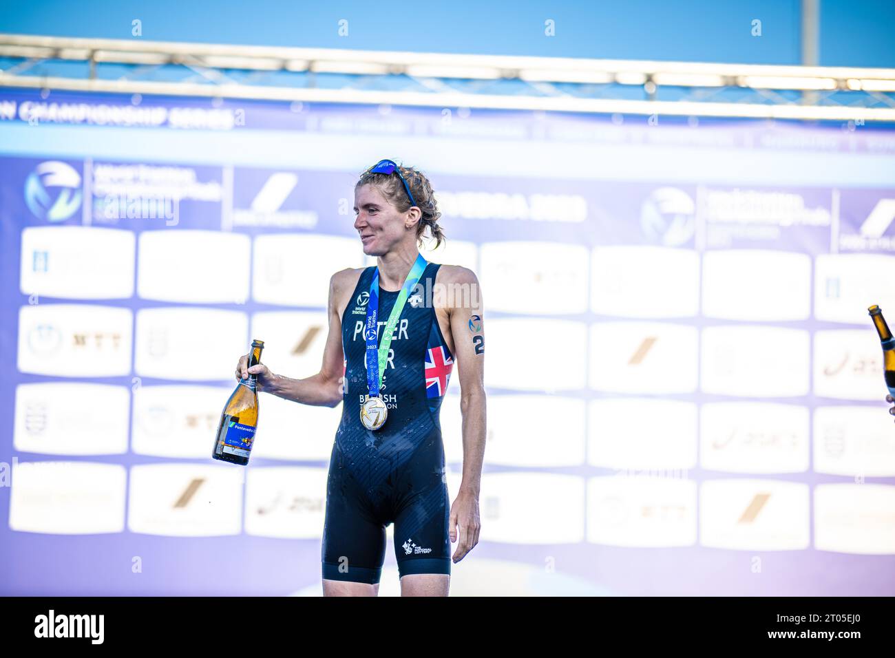 Beth Potter on the podium with the awards ceremony in the 2023 World ...