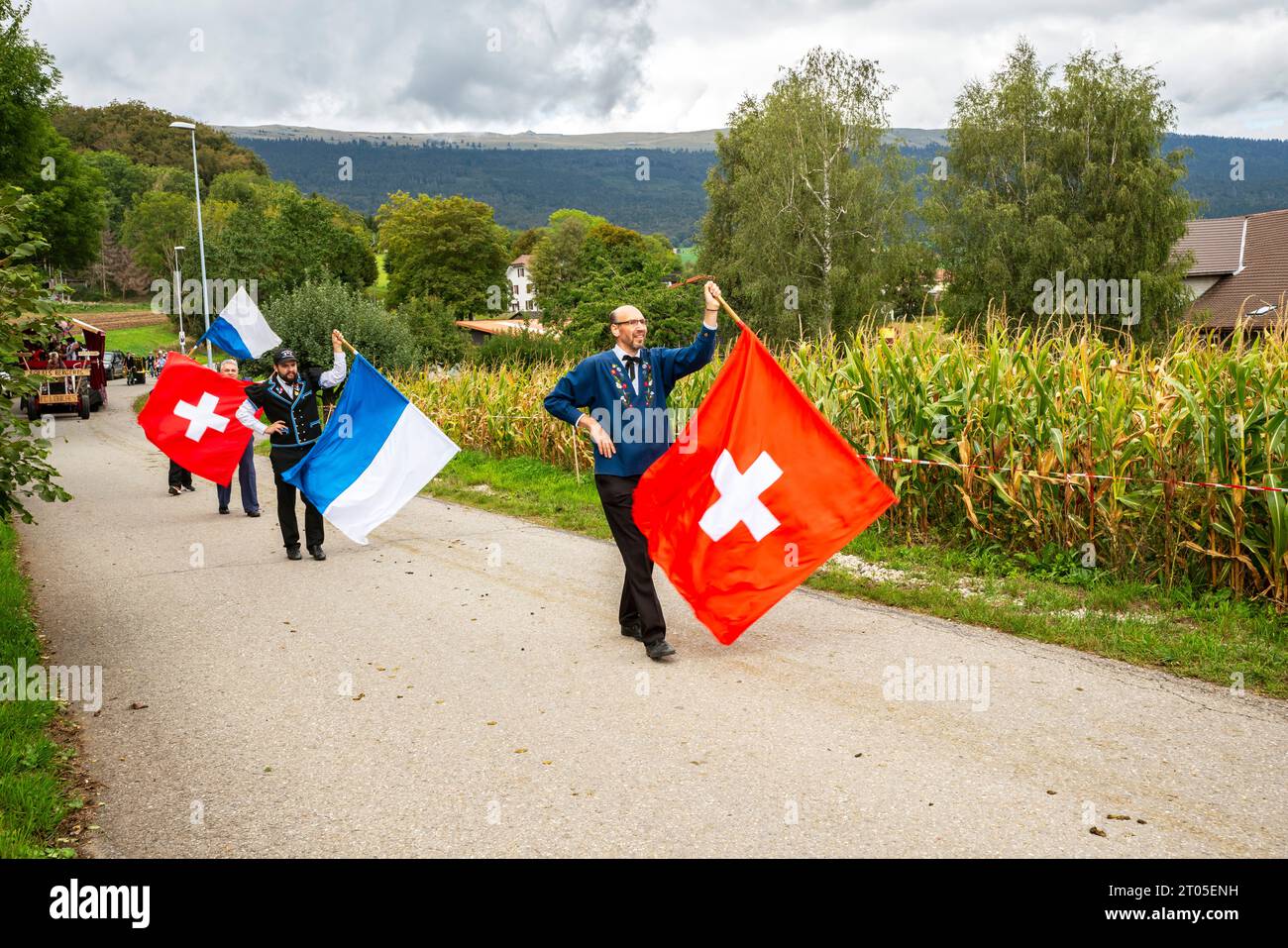 Villagers dressed in traditional costumes proudly take part in the ...