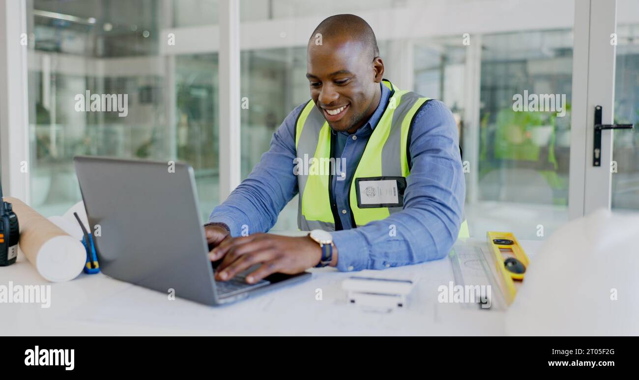 Laptop, smile and a black man construction worker in an office for ...