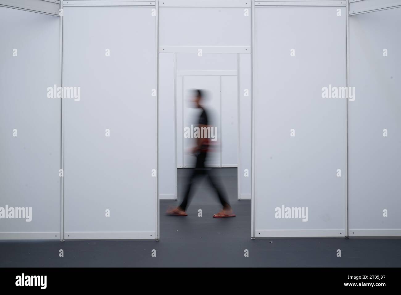 Berlin, Germany. 04th Oct, 2023. A man walks along a corridor in a ...