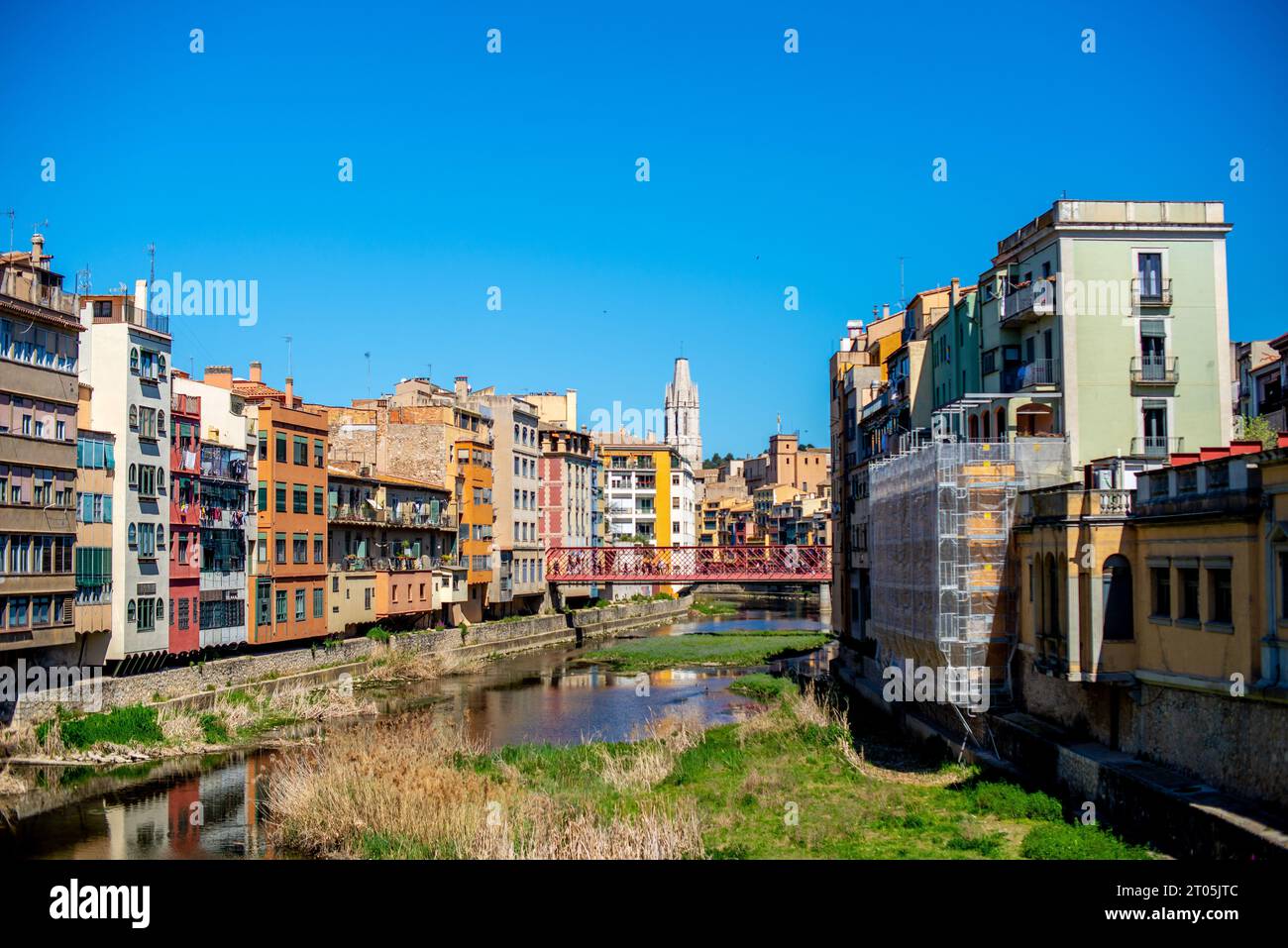 The Girona city in Catalonia, Spain, featuring a winding river snaking ...