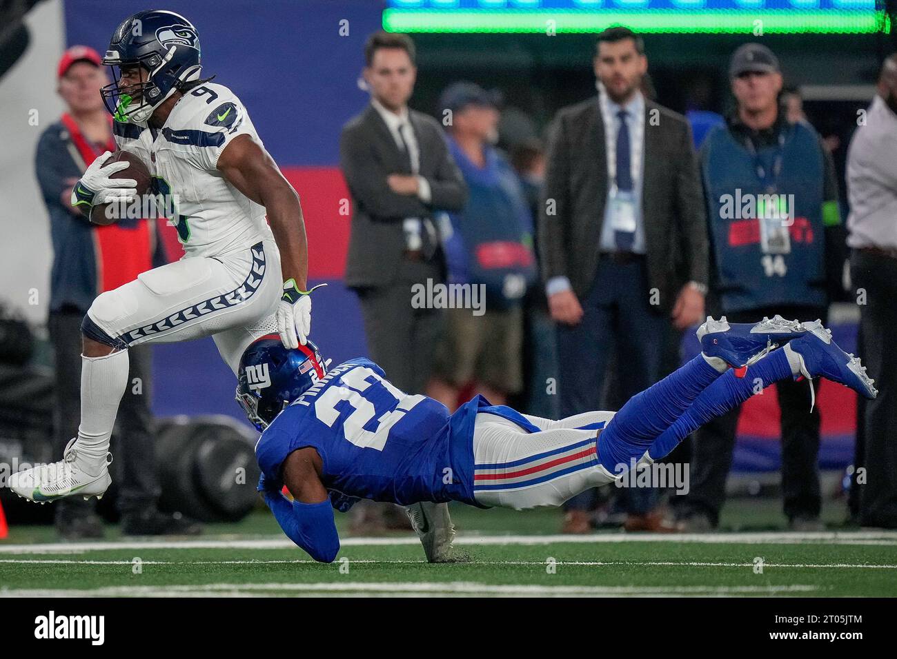 New York Giants safety Jason Pinnock (27) tackles Seattle Seahawks ...