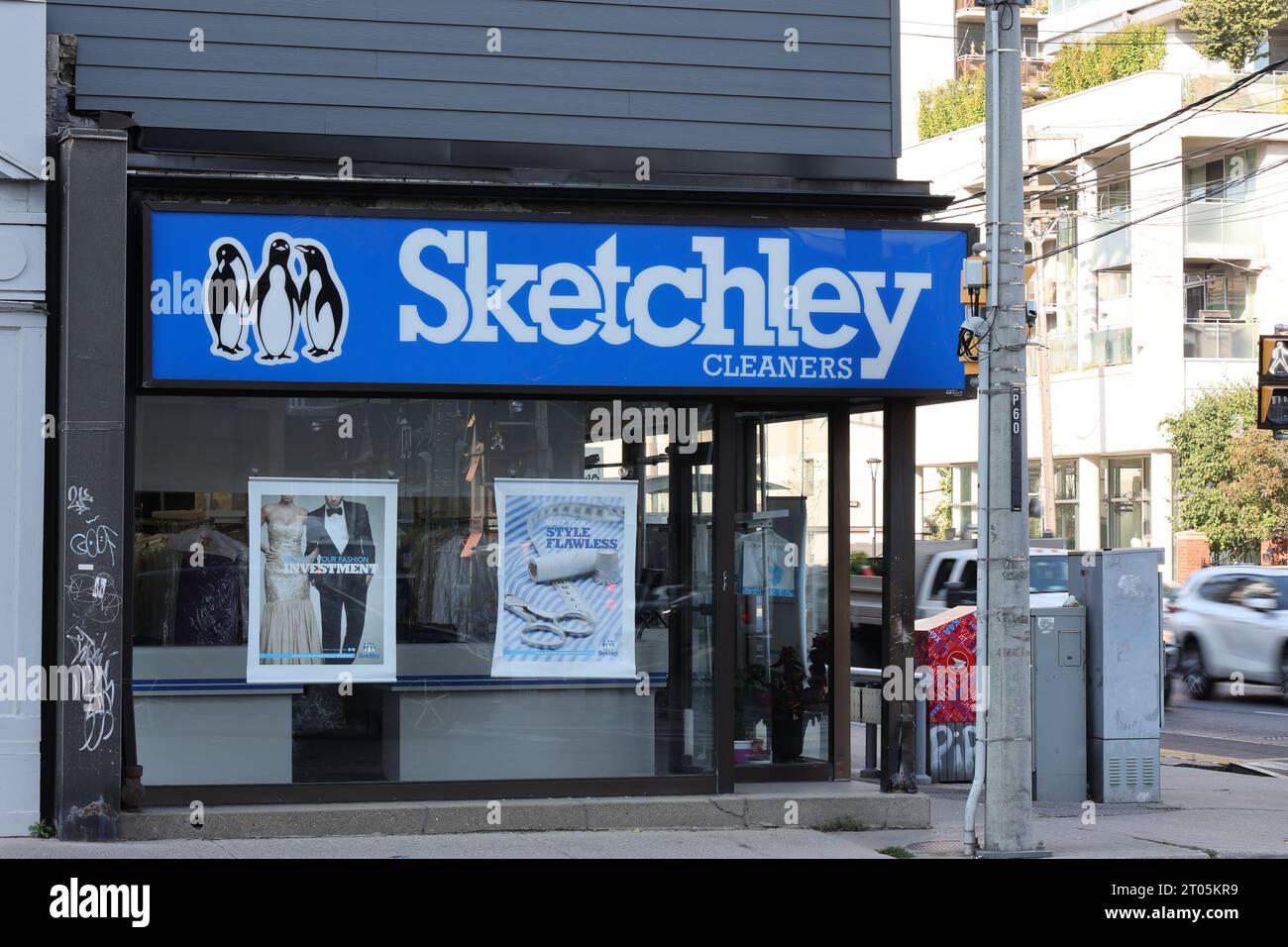 Dry Cleaning store in downtown of a city Stock Photo - Alamy