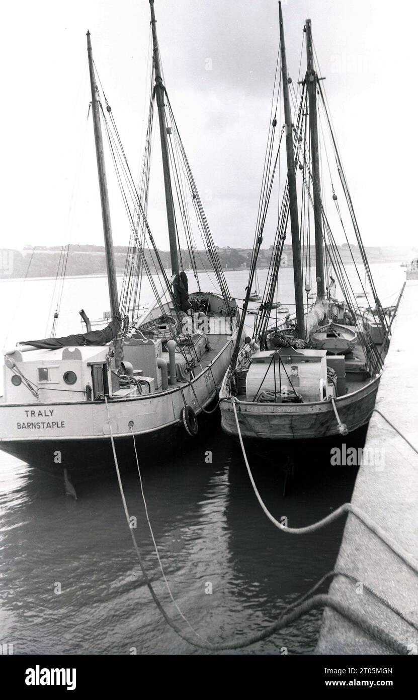 1950s, historical, two fishing boats, moored in a harbour at Barnstaple ...