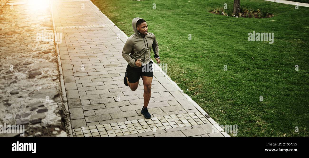 Fitness, park and black man running outdoor, exercise and training ...