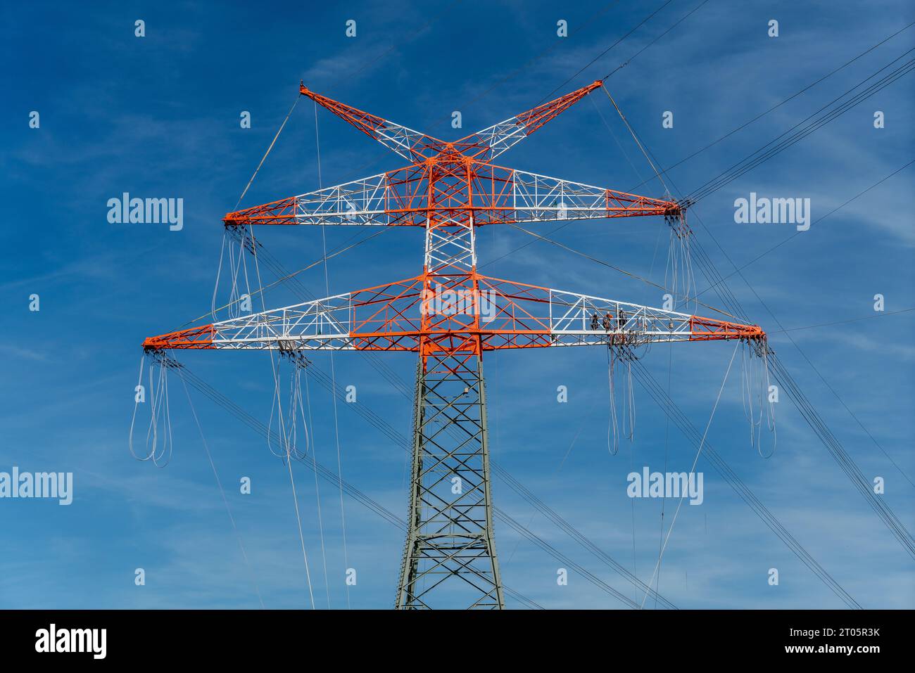 Assembly Of High Voltage Pylons Stock Photo - Alamy