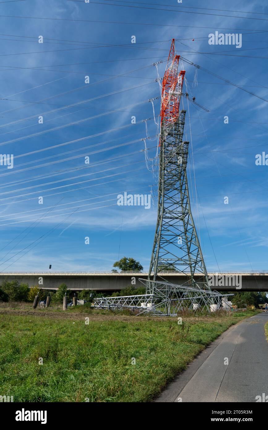 Assembly Of High Voltage Pylons Stock Photo - Alamy