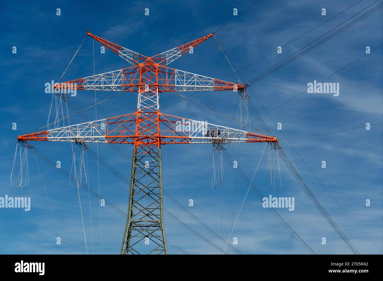 Assembly Of High Voltage Pylons Stock Photo - Alamy