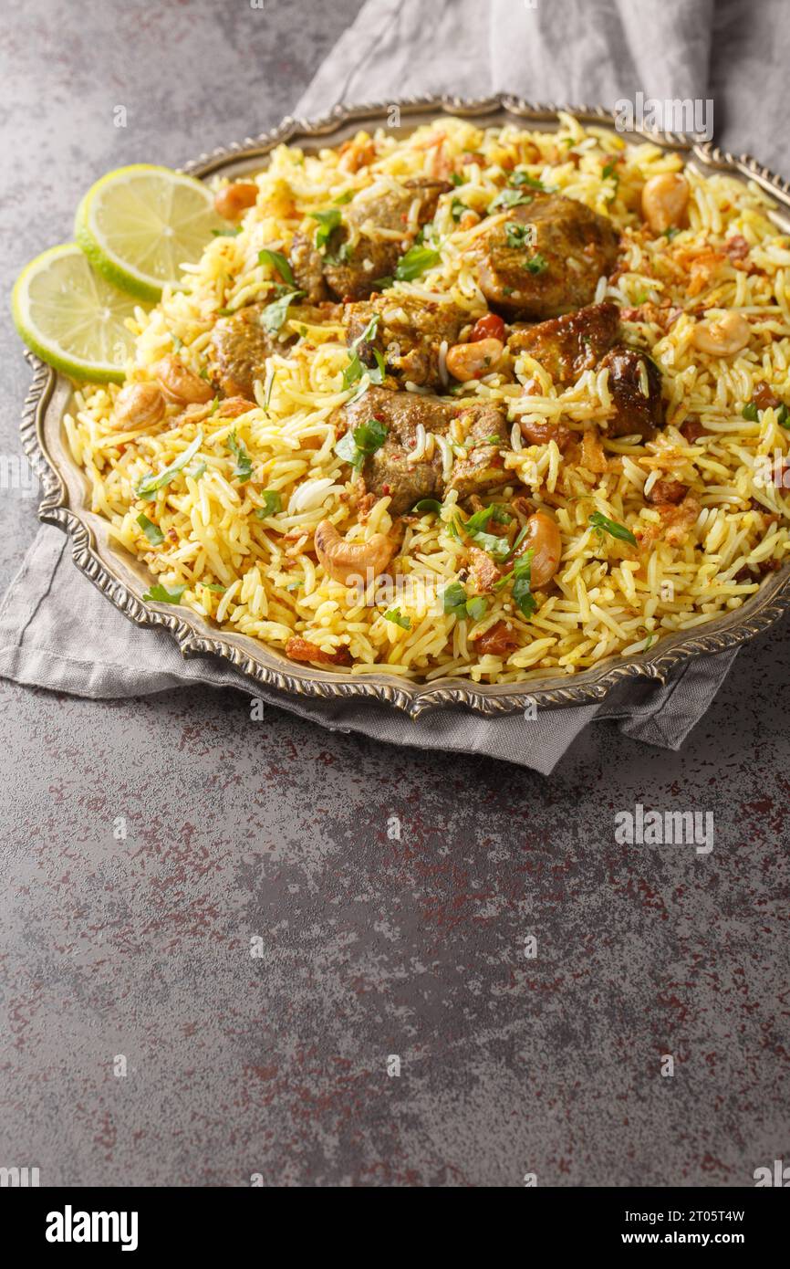 Kacchi Mutton Biryani is a delicious rice dish where tender lamb meat ...