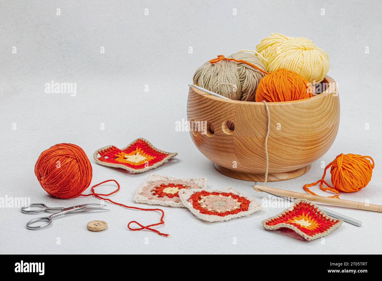 Set of clew of thread for knitting. Crocheted granny squares, handmade ...