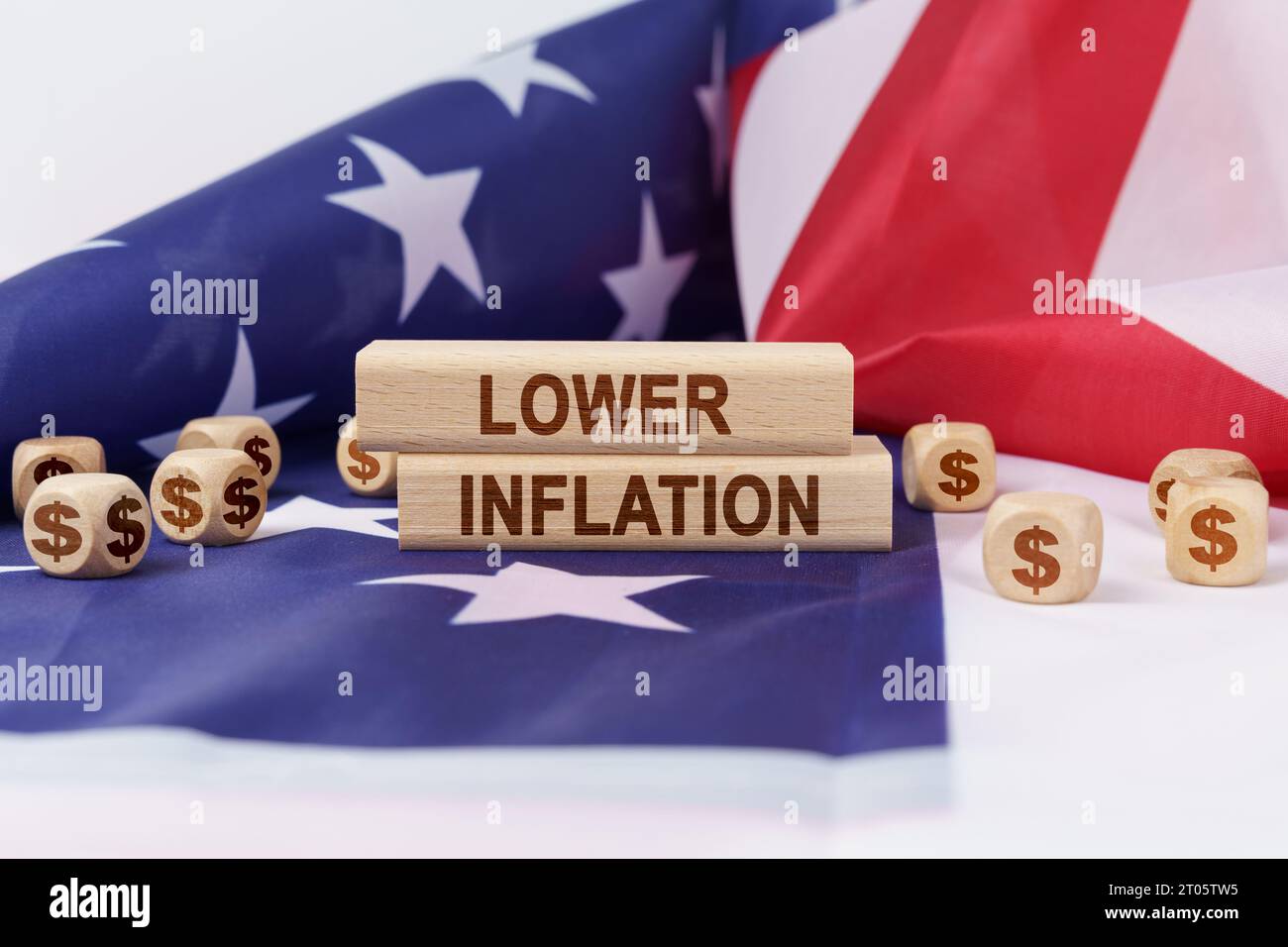 Economy and finance concept. On the flag of the United States lie cubes ...