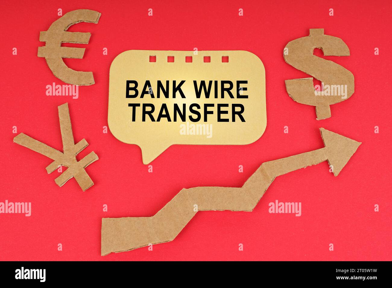 Business concept. On the red surface there are money symbols, an arrow ...