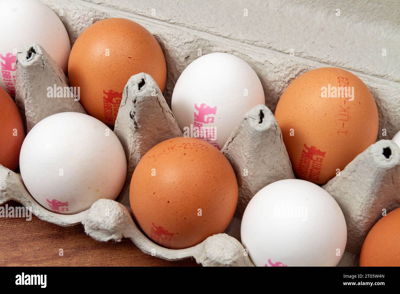 Mixed colour British eggs in box, close up Stock Photo - Alamy