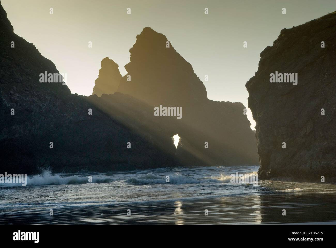 Window in rock on Meyers Creek Beach at Pacific coast in Pistol River ...