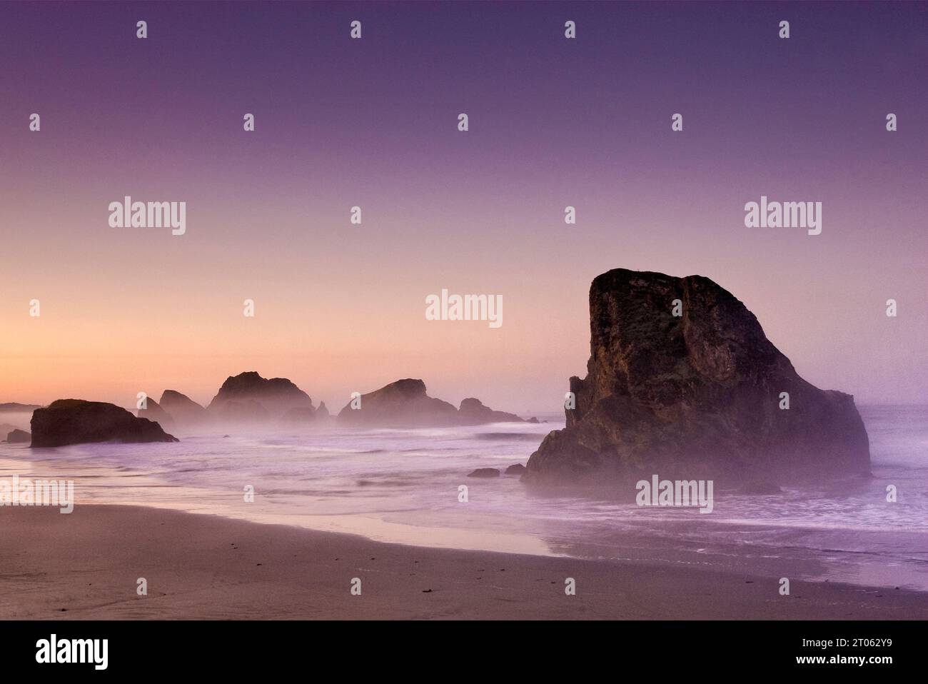 Rocks on Meyers Creek Beach in Pistol River State Park shrouded in fog ...