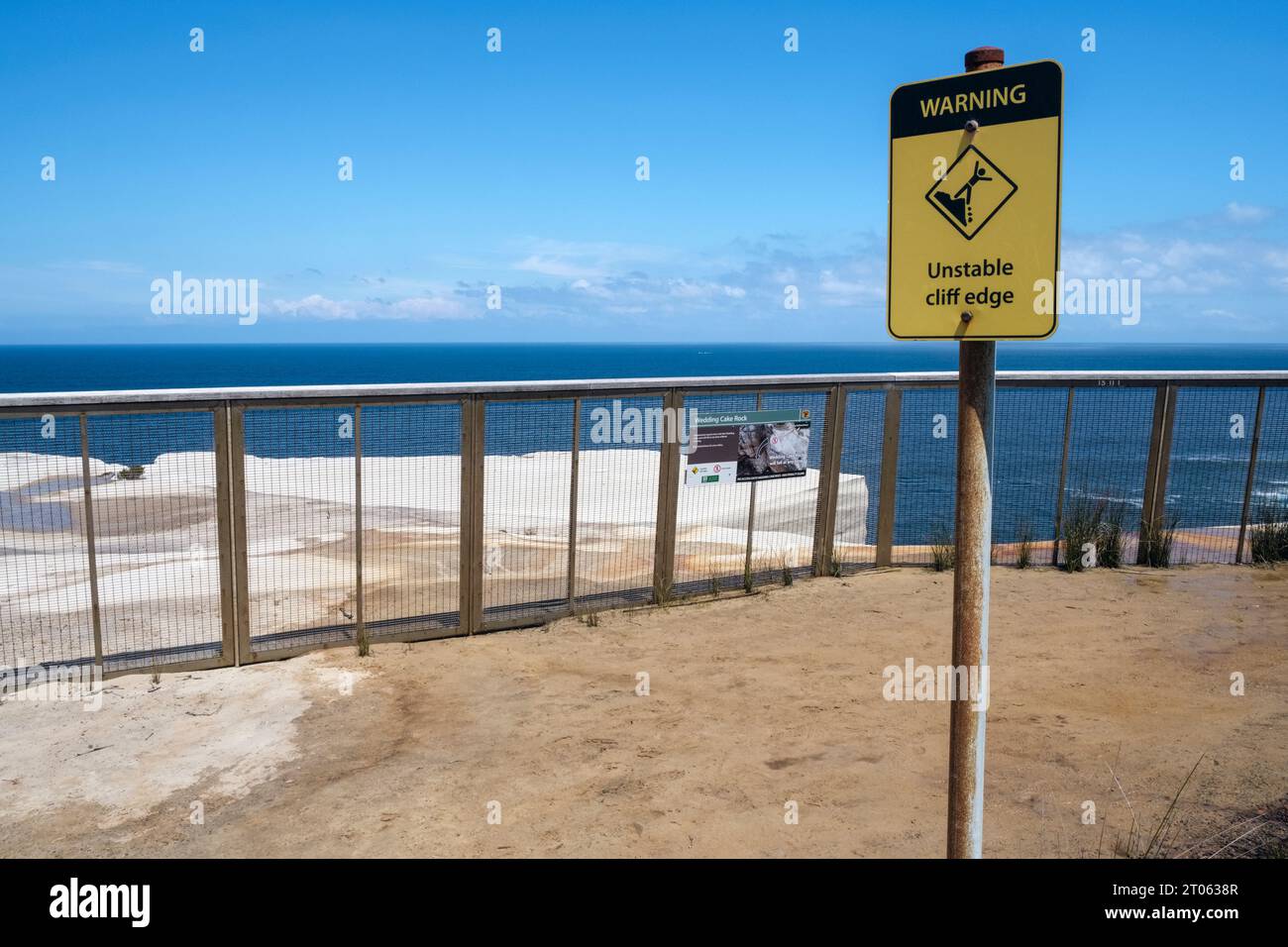 Sign warning of danger due to the unstable cliff edge, Wedding Cake ...