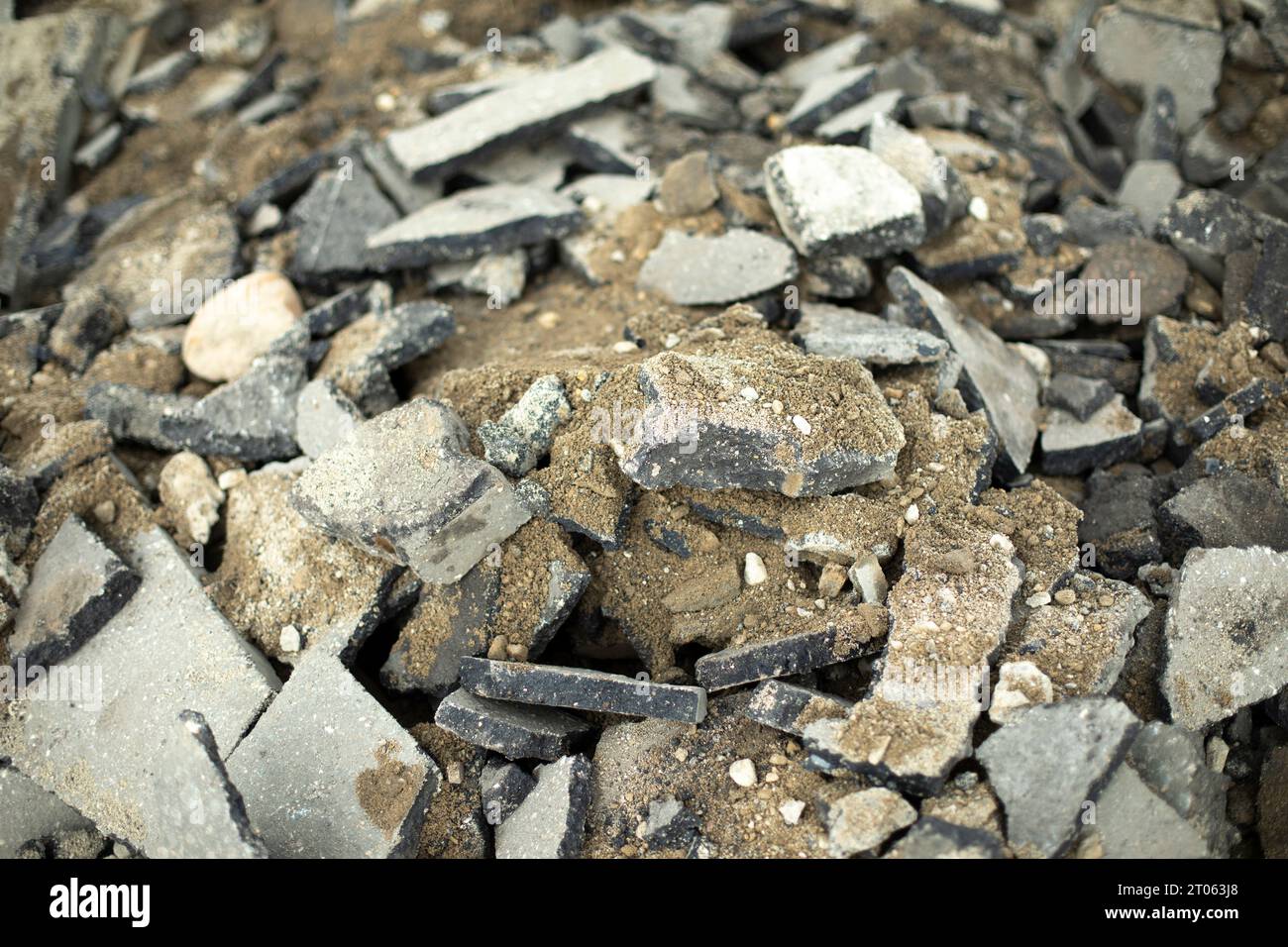 Construction waste. Dump of stones. Broken asphalt Stock Photo - Alamy