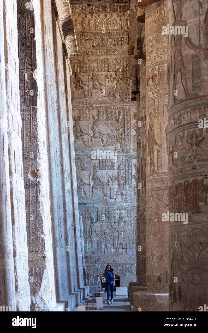 Carved symbols and hieroglyphs on the walls of Dendera Temple Complex ...