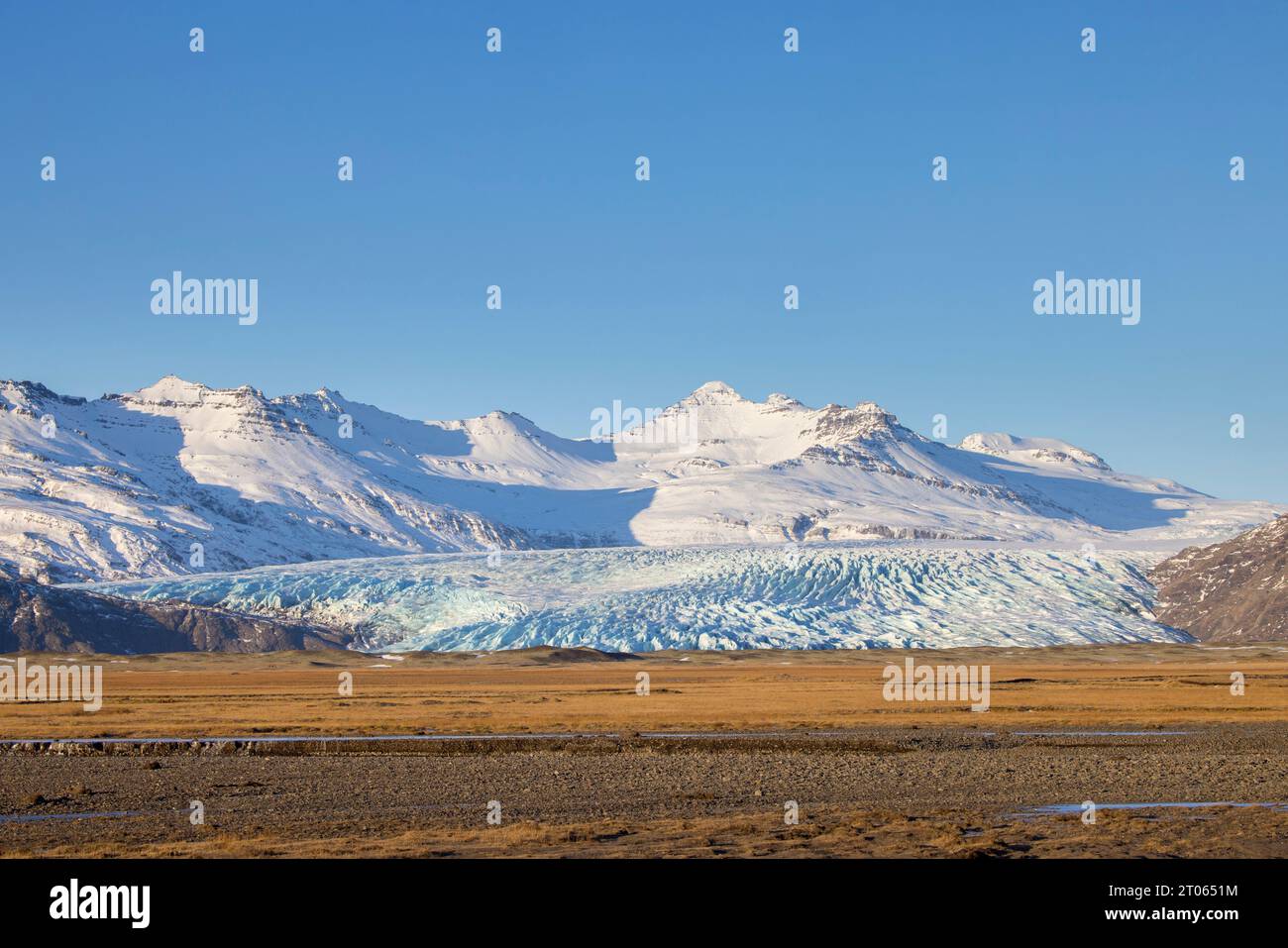 Aerial view over ice tongue Falljökull in winter, one of many outlet ...