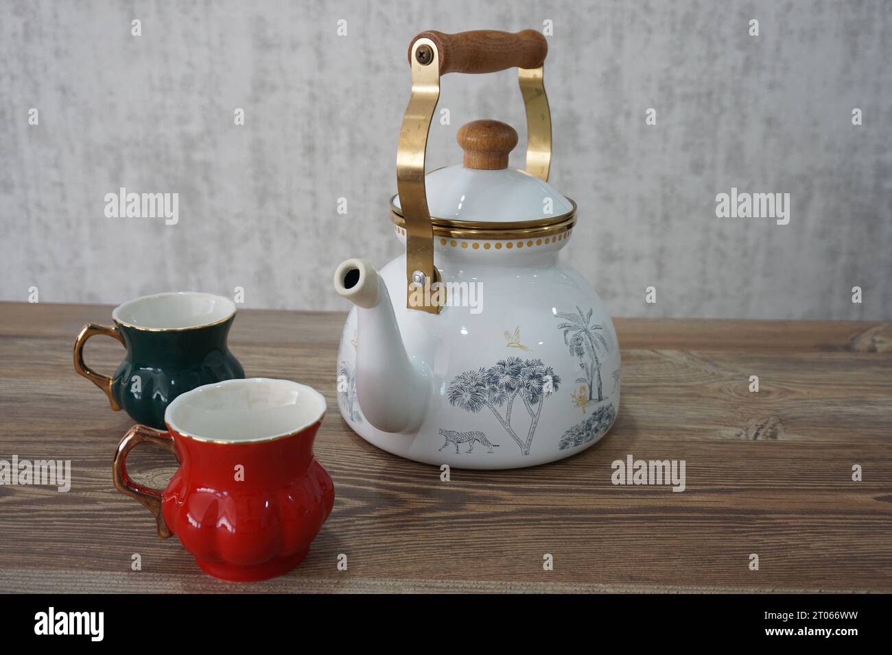 Teapot with wooden handle. Teapots and cups with wooden handles with ...