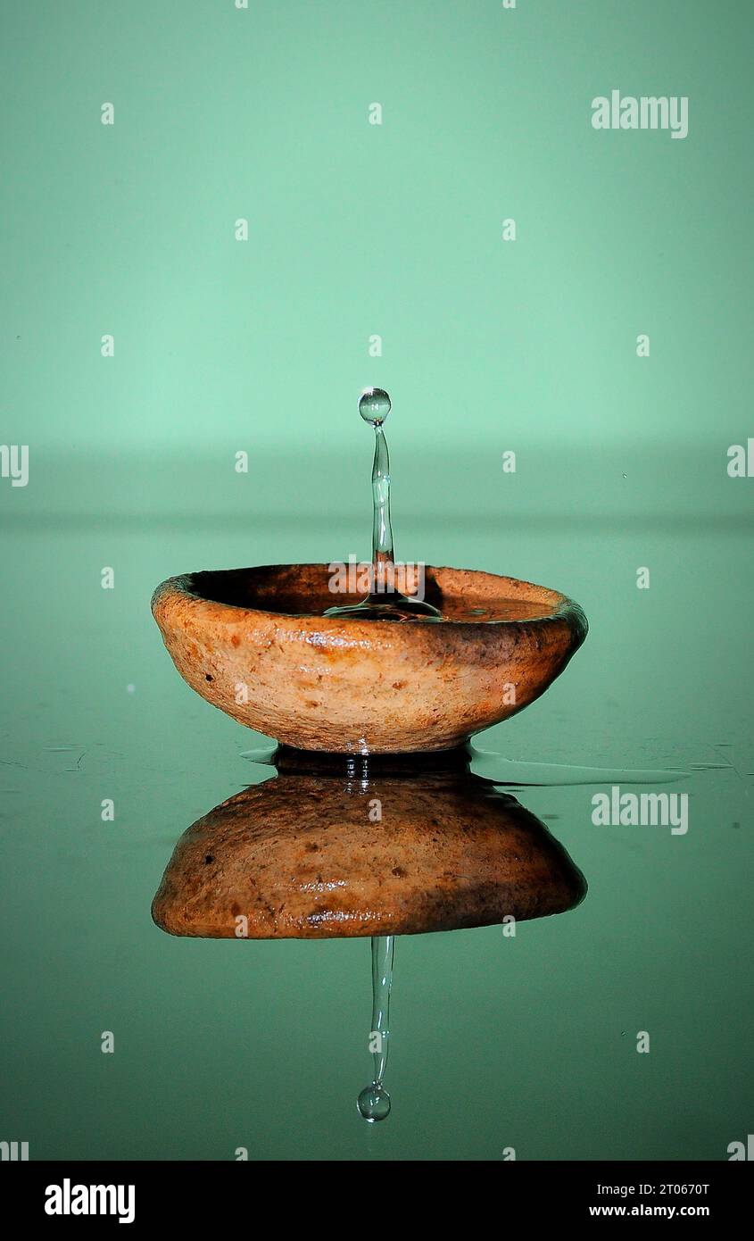 Water Splash on Spoon Crisp Details Stock Photo - Alamy