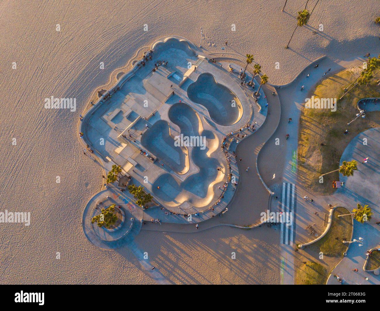 Aerial photos of the Venice Beach Skate Park taken with a drone during sunset. Long shadows of ...