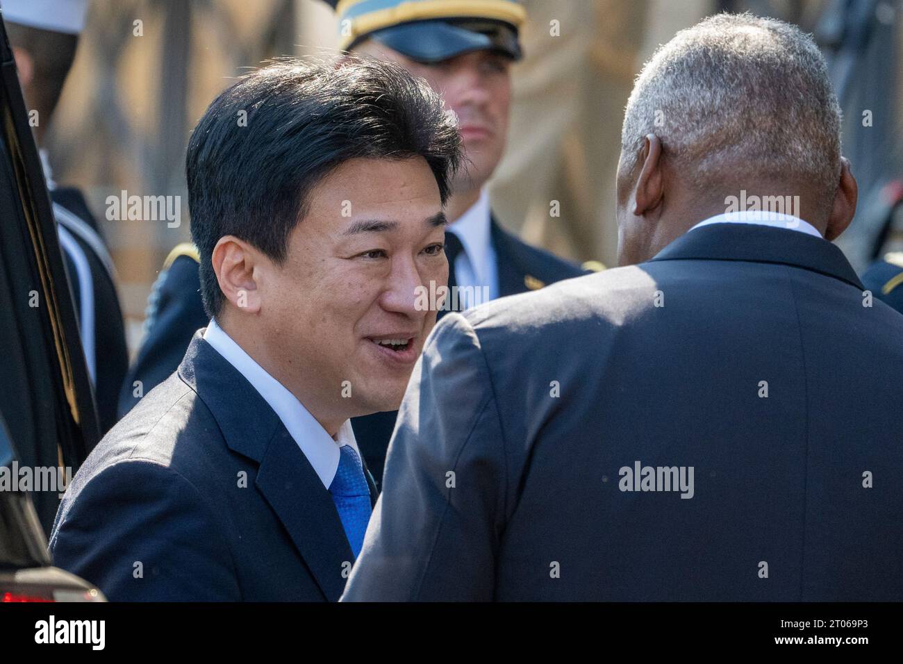 Secretary of Defense Lloyd Austin, right, greets Japanese Defense ...