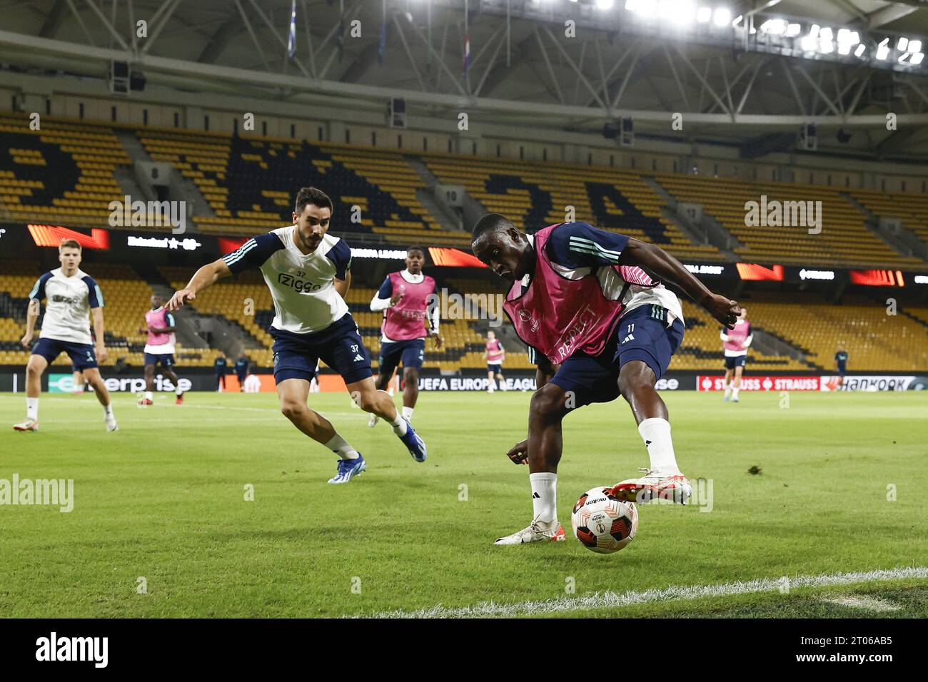 ATHENS - (l-r) Josip Sutalo of Ajax, Carlos Forbs of Ajax during the ...
