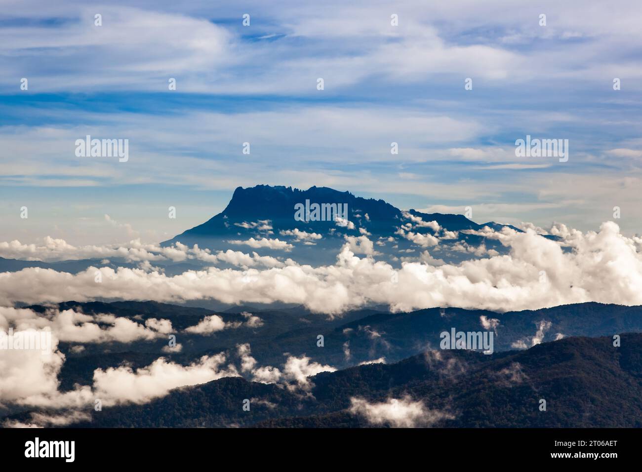 Mt. Kinabalu in clouds at Borneo from Mt. Trusmadi summit Stock Photo ...