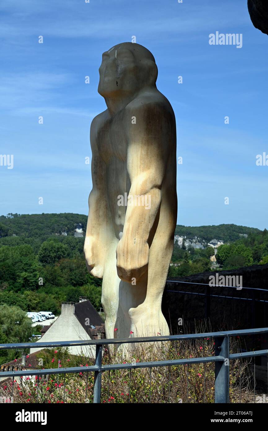 The statue of Cro Magnon Man looks out over the Dordogne river and ...