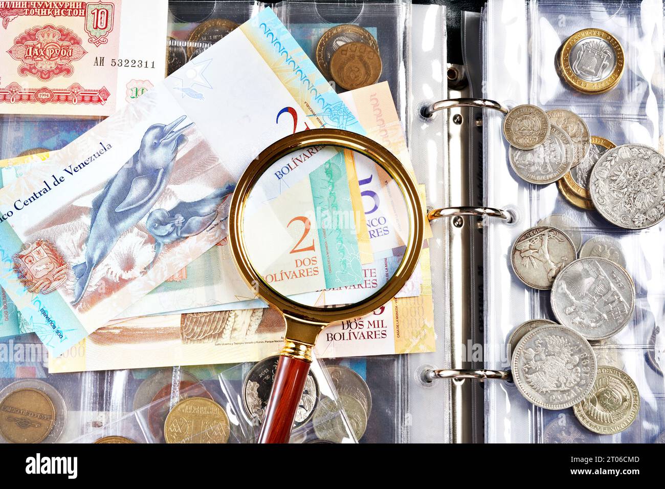 Coins and venezuelan bolivars banknotes. Numismatics. Money and notes ...