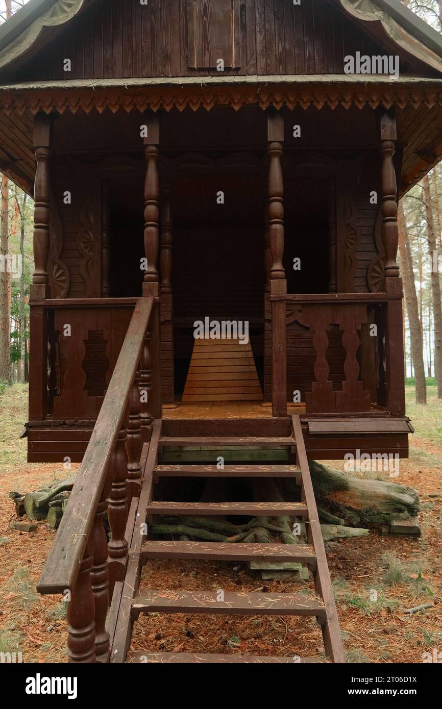 Spooky and Beautiful hut on a tree stump in the forest. The concept of ...