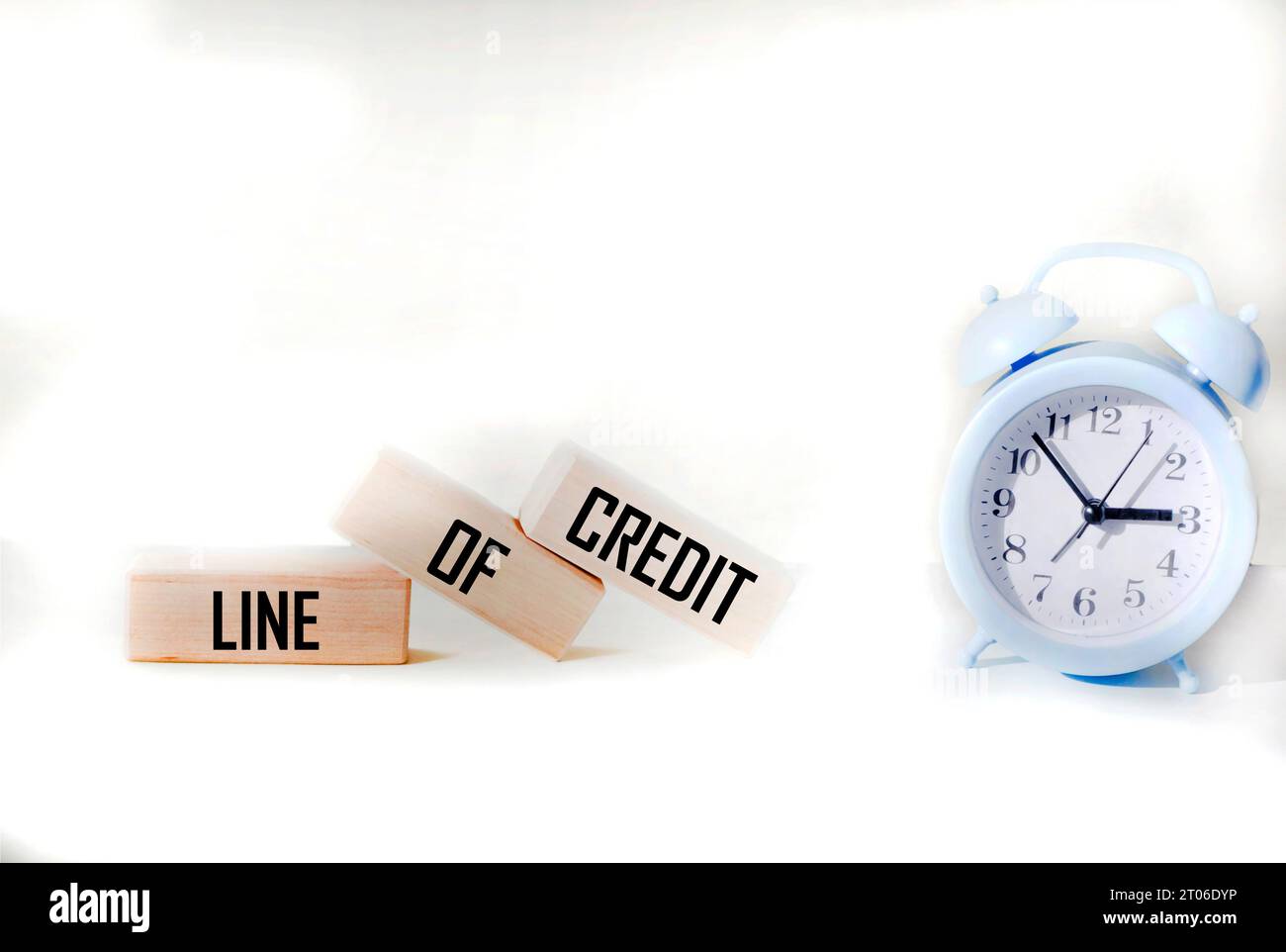 Wooden blocks with the inscription LINE OF CREDIT on a white background ...