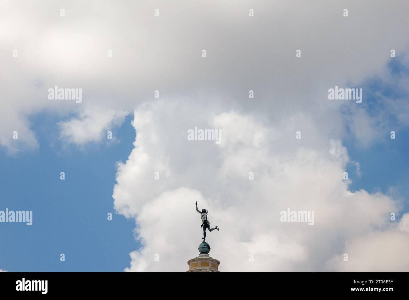 Minimalist view of the Giraldilla, a small statue on top of a colonial ...