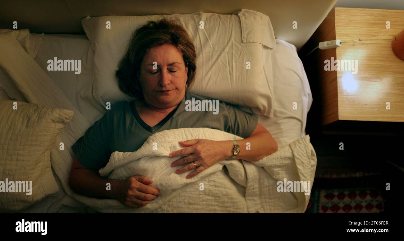 Happy woman relaxing home night hi-res stock photography and images - Alamy