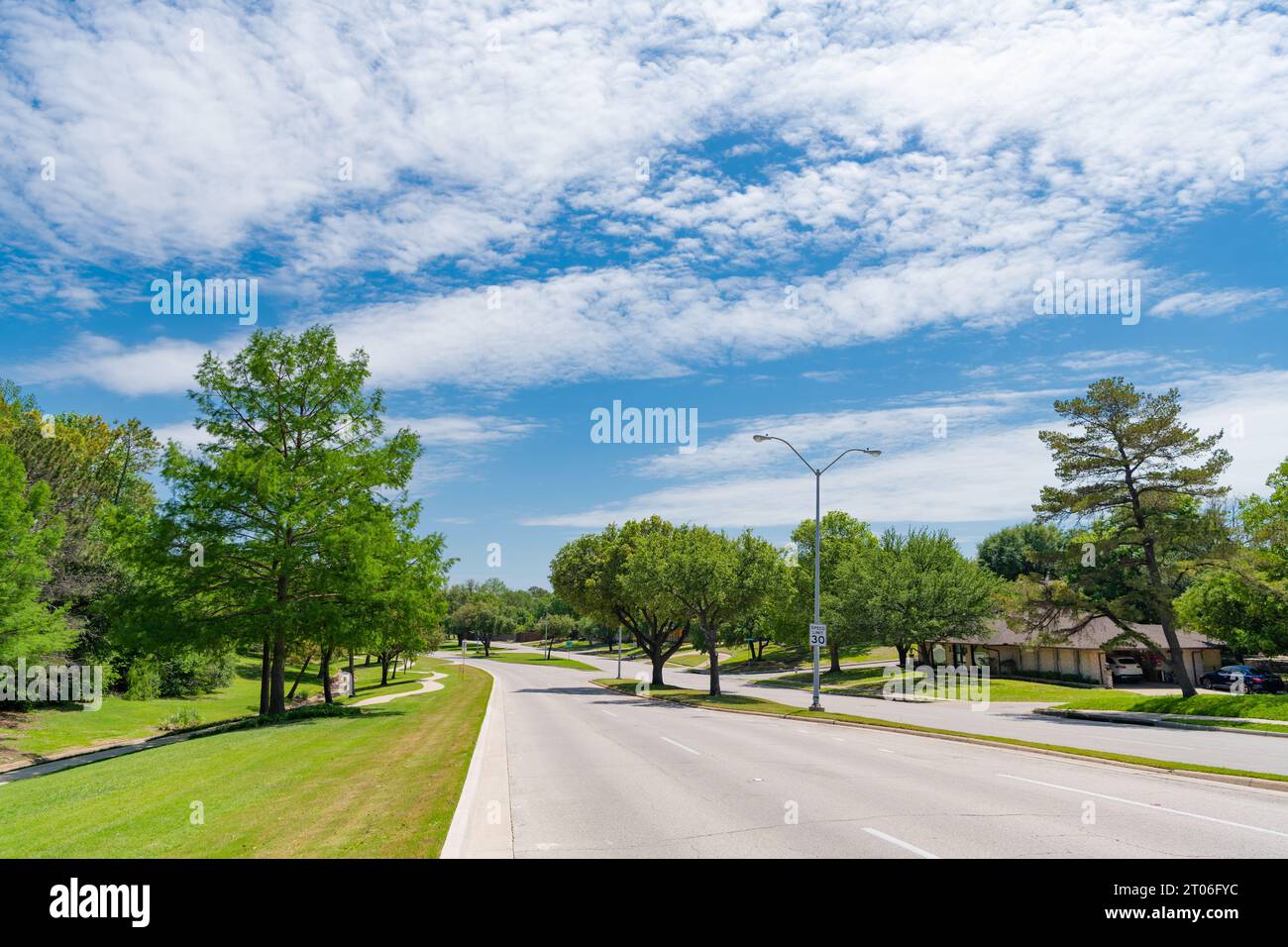 road way with no cars. empty road with neighborhood destination in ...