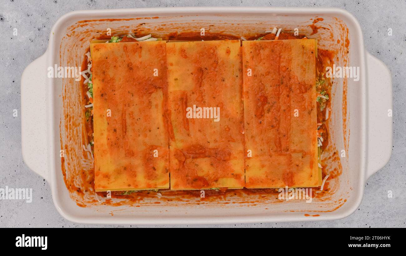 Assemble the lasagna. Topping last layer of lasagna with marinara sauce ...