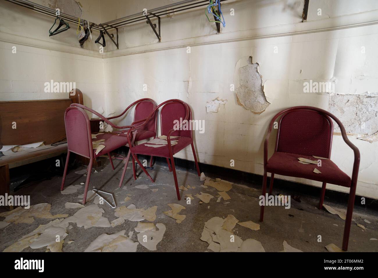 Chairs left in an old abandoned building Stock Photo - Alamy