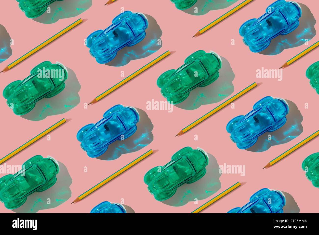 Trendy racing cars pattern made of pencils and pencil sharpeners on ...