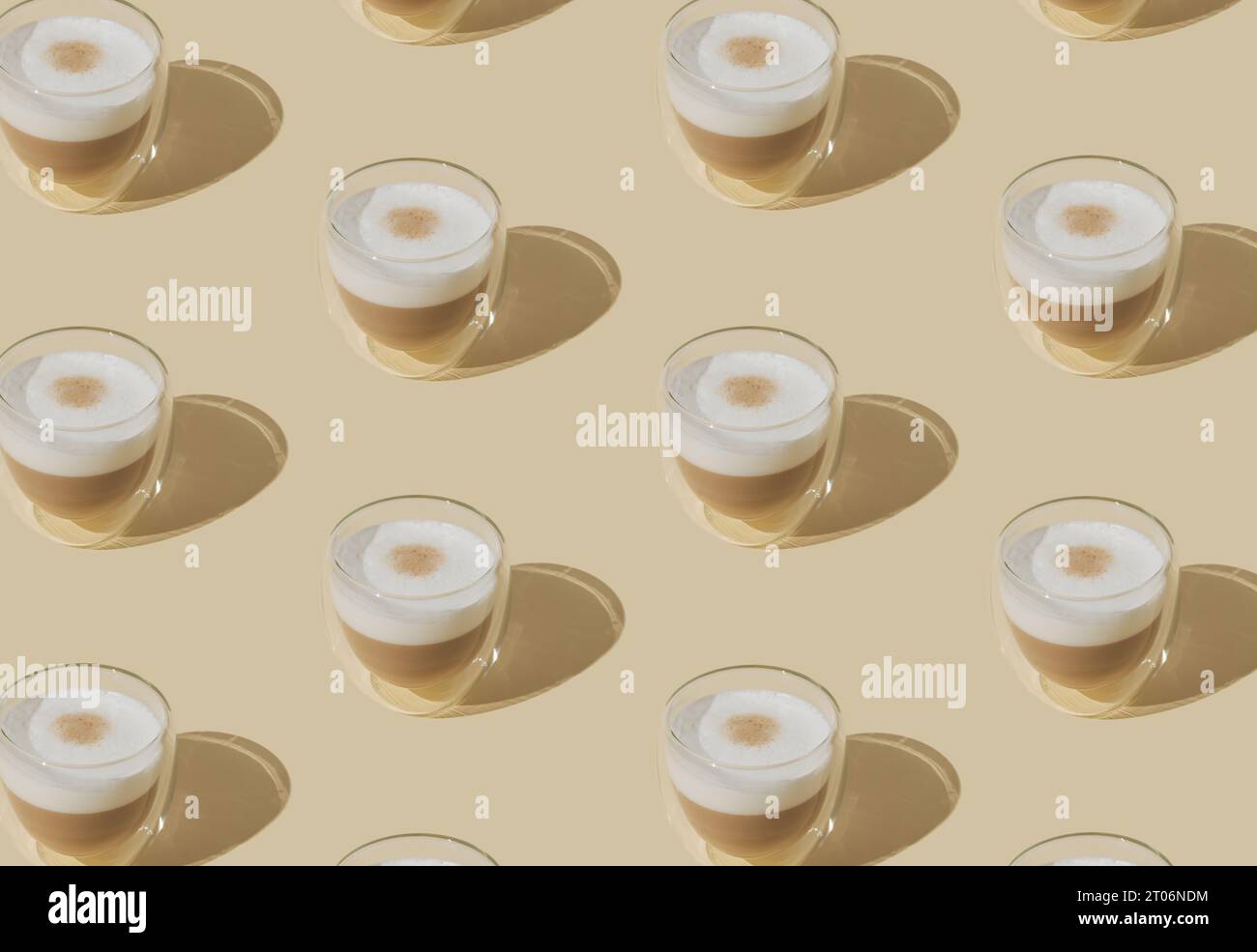 Trendy pattern made of cup of coffee on pastel cream background ...