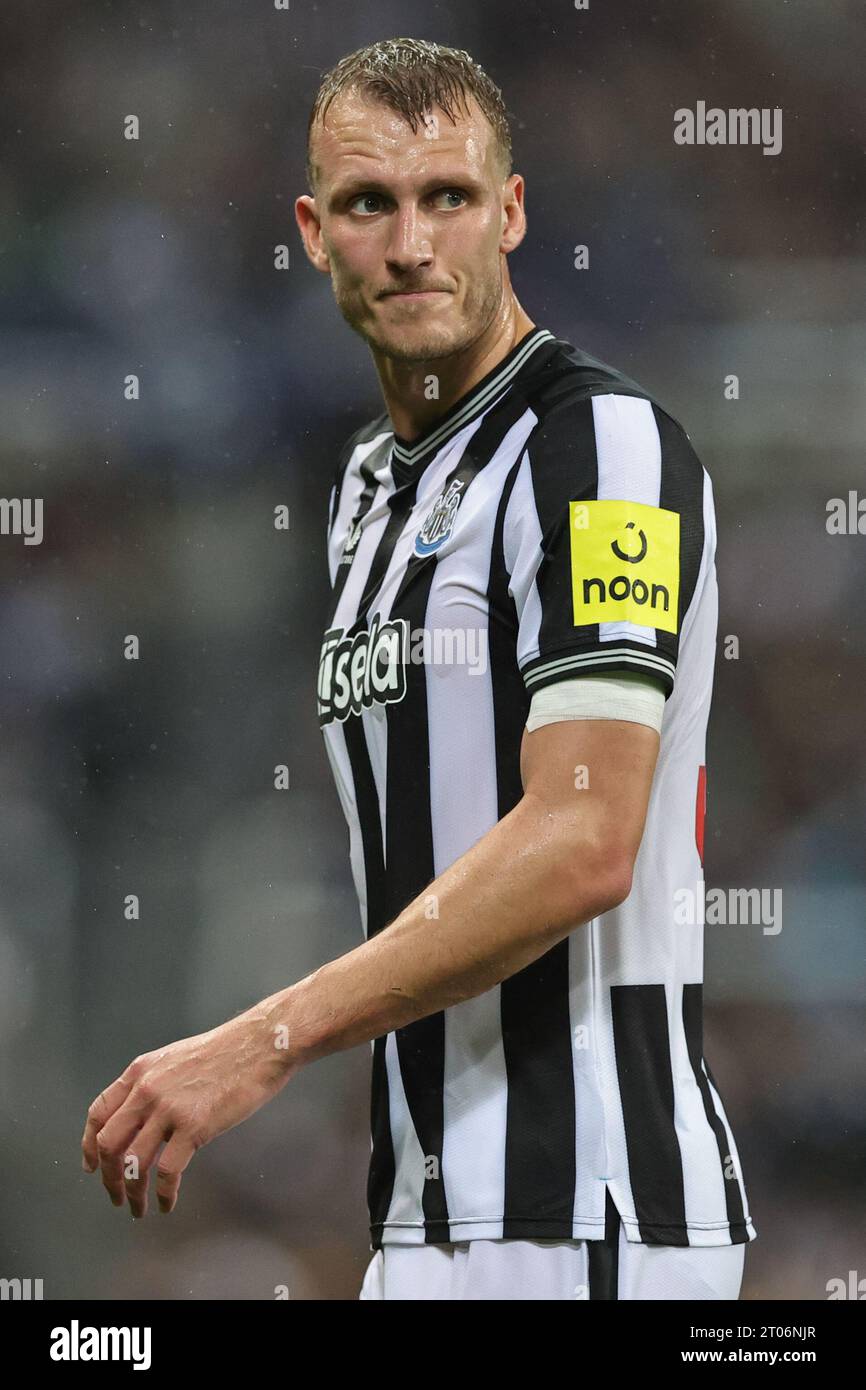 Dan Burn #33 of Newcastle United during the UEFA Champions League match ...