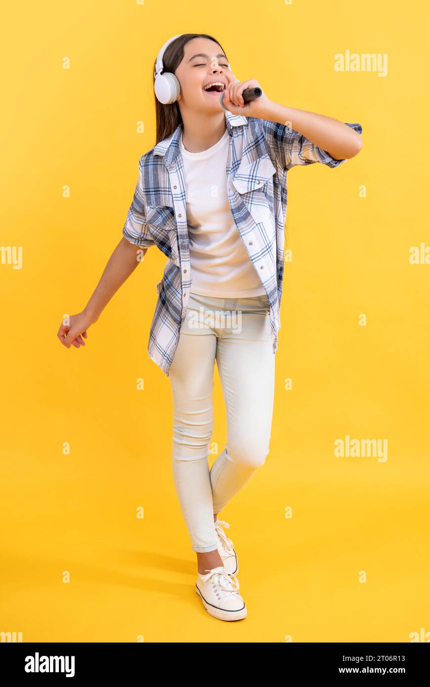 sing music song. young singer singing in mic. teen girl having fun at ...