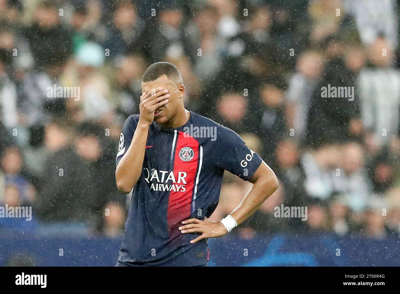 PSG's Kylian Mbappe touches his face during the Champions League group ...