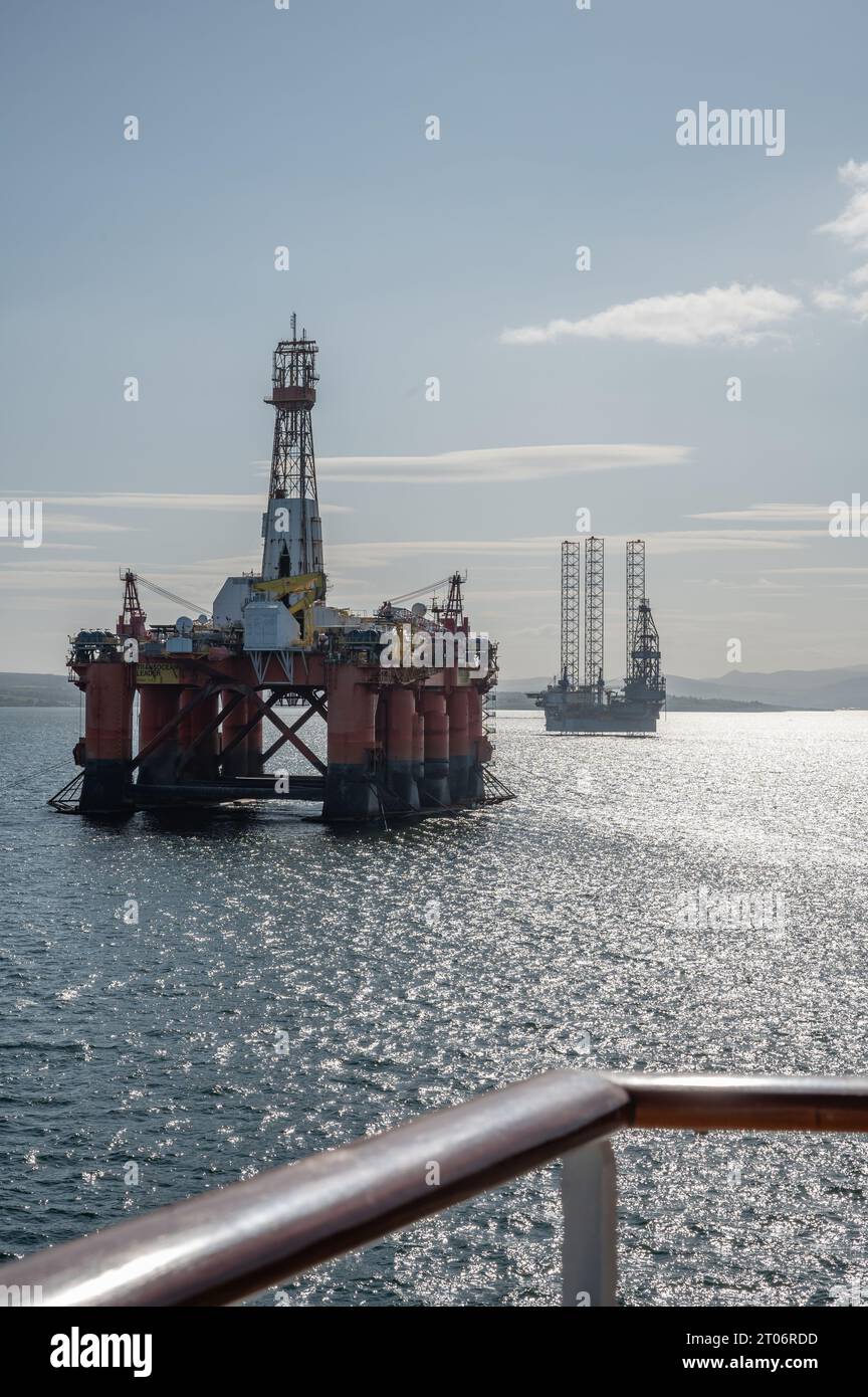 Oil Platform and offshore wind turbine installation ship in the bay of ...