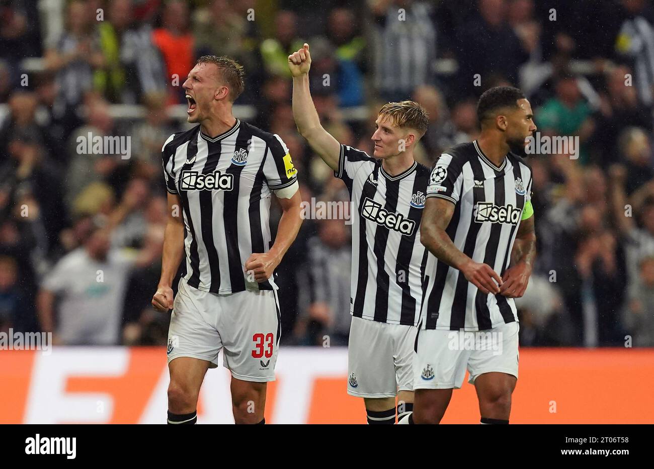 Newcastle United's Dan Burn celebrates scoring their side's second goal ...